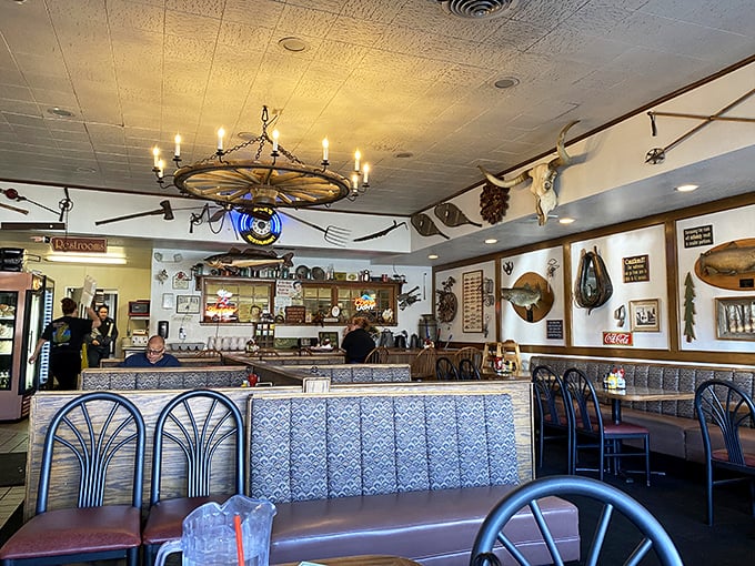 Step inside and you're greeted by wagon wheel chandeliers and mounted trophies – not a designer's vision of the West, but the real deal, seasoned with decades of stories.