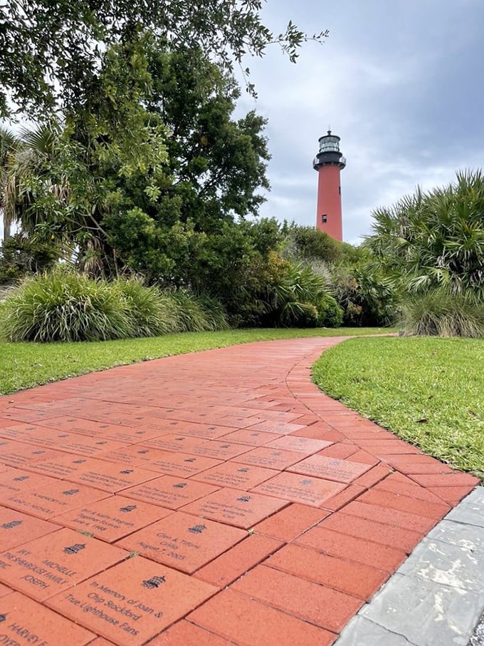 This brick pathway isn't just a path—it's a journey through history, with each commemorative brick telling a story of lighthouse lovers.