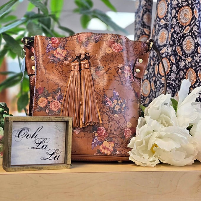 Not your average thrift store find! This floral tasseled handbag proves yesterday's splurges become today's affordable treasures at Ooh La La.