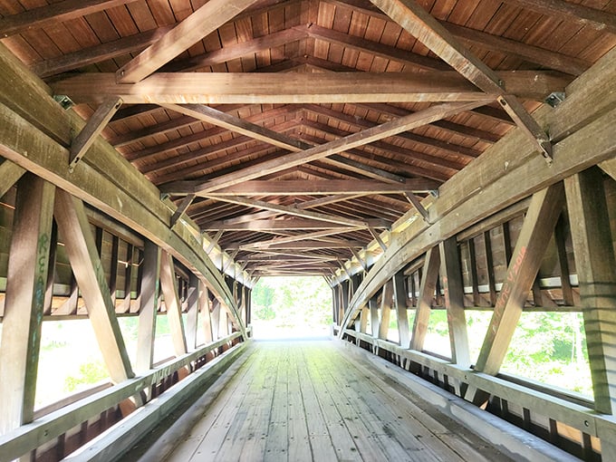 Step inside and marvel at the intricate wooden lattice work—a cathedral of engineering where sunlight plays hide-and-seek between massive timber beams.