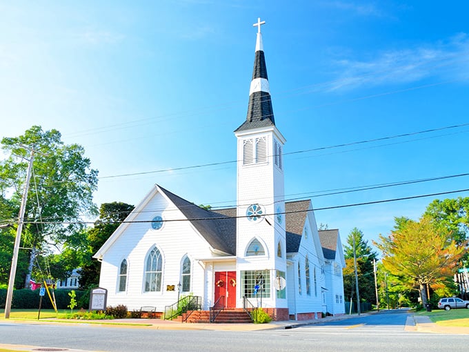 This pristine white church isn't just architectural eye candy—it's the spiritual heart of Onancock, standing tall against that impossibly blue Virginia sky.