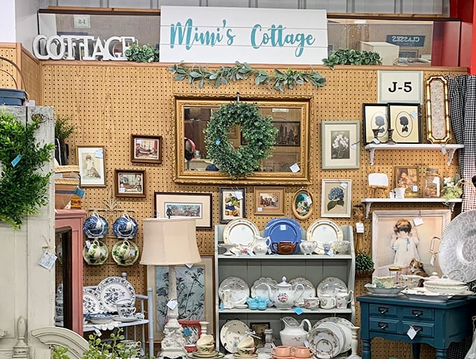 "Mimi's Cottage" isn't just a booth—it's a perfectly curated slice of grandmotherly heaven, where every teacup and frame seems to whisper, "Take me home."