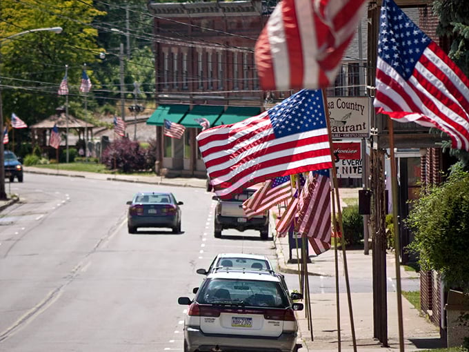American flags flutter proudly along Mount Jewett's thoroughfare, where patriotism isn't just for holidays—it's woven into the town's everyday fabric.