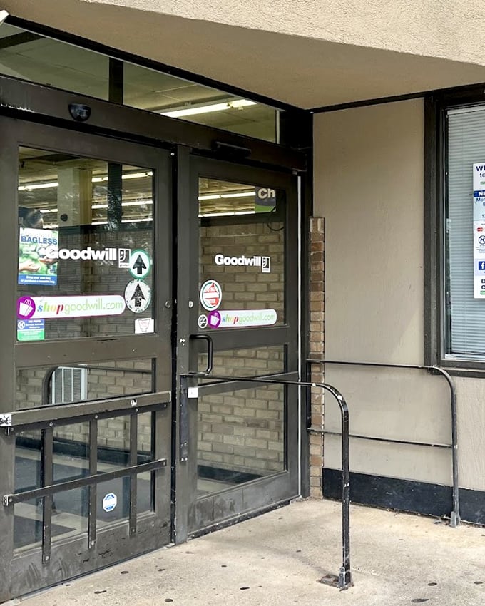 Push through these doors and enter the treasure hunt. The Goodwill entrance might not scream "retail therapy," but your wallet will thank you.