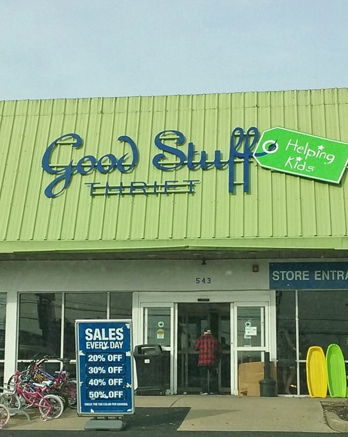 Daily sales ranging from 20-50% off? That blue sign might as well say "Warning: Spontaneous Shopping Joy Ahead."