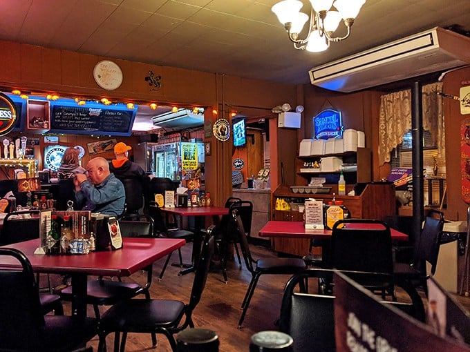 Wood paneling, neon signs, and red-topped tables create that perfect "loosen your belt" atmosphere. This isn't a place for pretension—it's a temple of honest-to-goodness flavor.