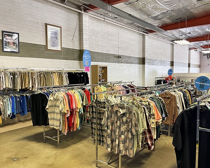 Organized chaos at its finest! Row after row of men's shirts create a kaleidoscope of patterns that would make any vintage enthusiast weak at the knees.