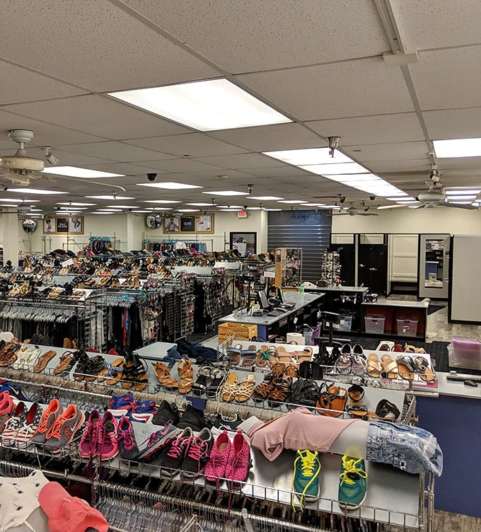 A shopper's paradise unfolds with endless racks strategically organized—none of that archaeological dig experience you get at typical thrift stores.