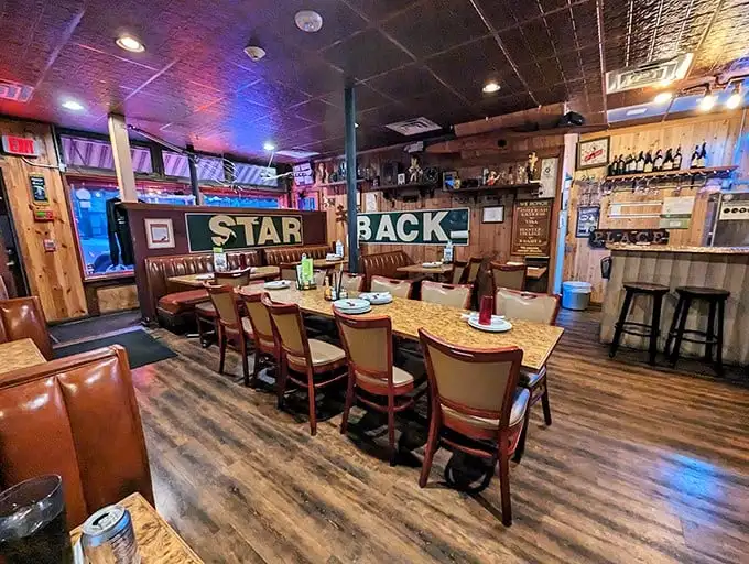 Inside, wood-paneled walls and vintage memorabilia create the perfect time capsule – like dining in your coolest uncle's basement circa 1978.