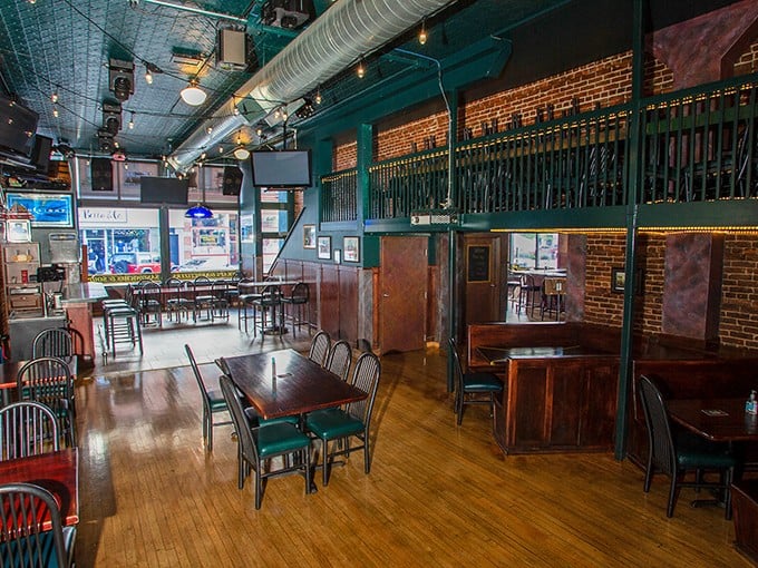 Step inside and discover the perfect marriage of historic charm and sports bar energy, where exposed brick walls tell stories while TVs keep score.