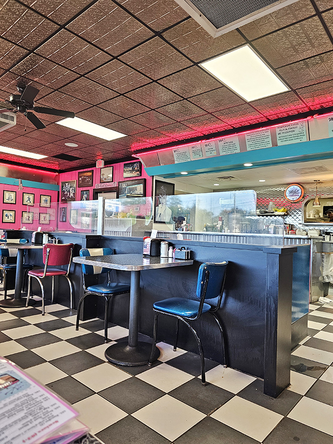 Pink walls, turquoise trim, and chrome accents—this isn't just a diner, it's a time machine that serves coffee.