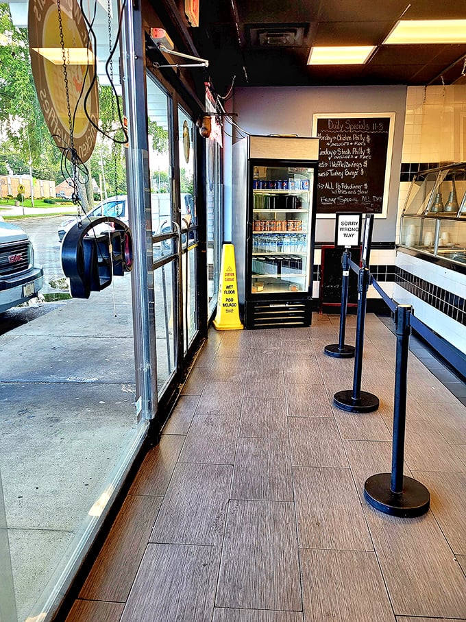 Step inside and follow your nose—that heavenly aroma isn't angels singing, it's chicken frying to golden perfection just beyond those doors.