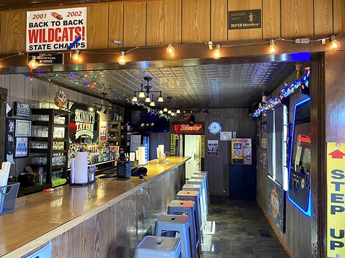 Where memories are made between bites. The classic wood-paneled bar, string lights, and local sports memorabilia create the perfect backdrop for food that doesn't need fancy surroundings.