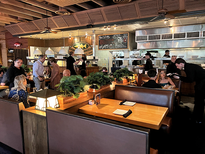 Inside, warm wood tones and lush greenery create that perfect "I've discovered somewhere special" feeling. Booths invite lingering conversations over bisque.