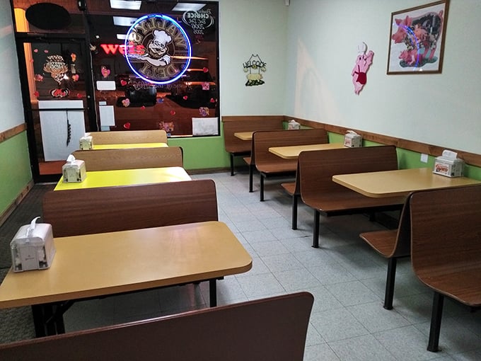 Simple booths, mint-green walls, and zero pretension – Wally's interior tells you they're focusing on what matters: sandwich perfection, not fancy decor.