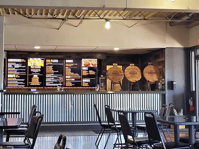 Where barbecue dreams come true! The corrugated metal counter and wooden barrel displays create that perfect "we're serious about our meat" atmosphere.