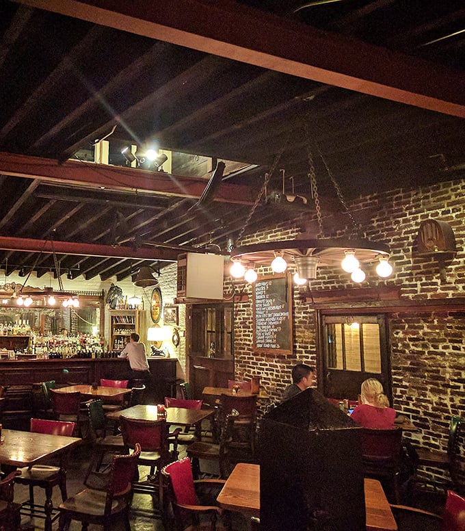 Step inside and time slows down – exposed brick walls, wooden beams, and that perfect amber lighting create the cozy backdrop for memorable meals and conversations.