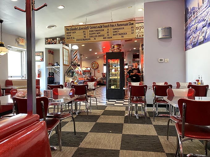 Classic red vinyl chairs and checkerboard floors transport you to a simpler time. This isn't retro by design—it's authentic diner magic that never went out of style.
