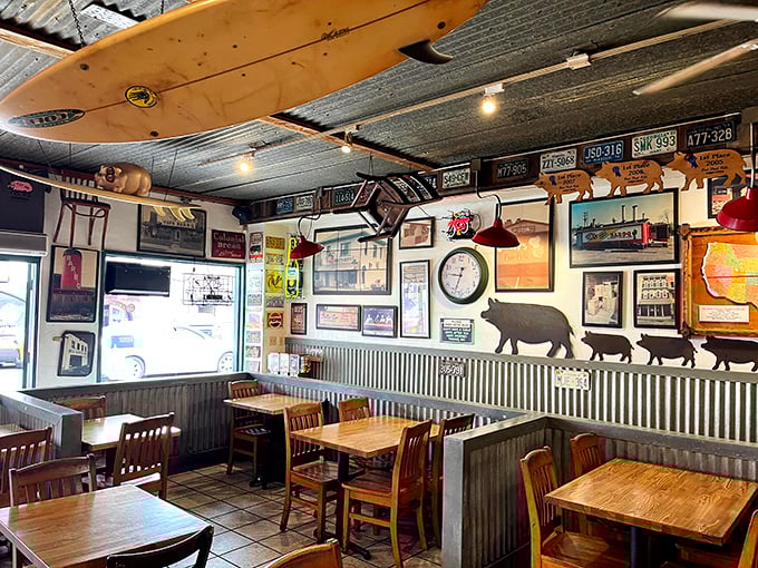 Where surfboards meet smoke rings. This interior blends California coastal charm with serious BBQ credentials – those pig silhouettes aren't just for decoration, folks.