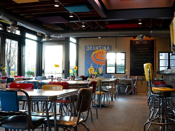 Colorful chairs and vintage posters create that perfect "I've discovered something special" atmosphere. This isn't just a meal—it's a Michigan moment.