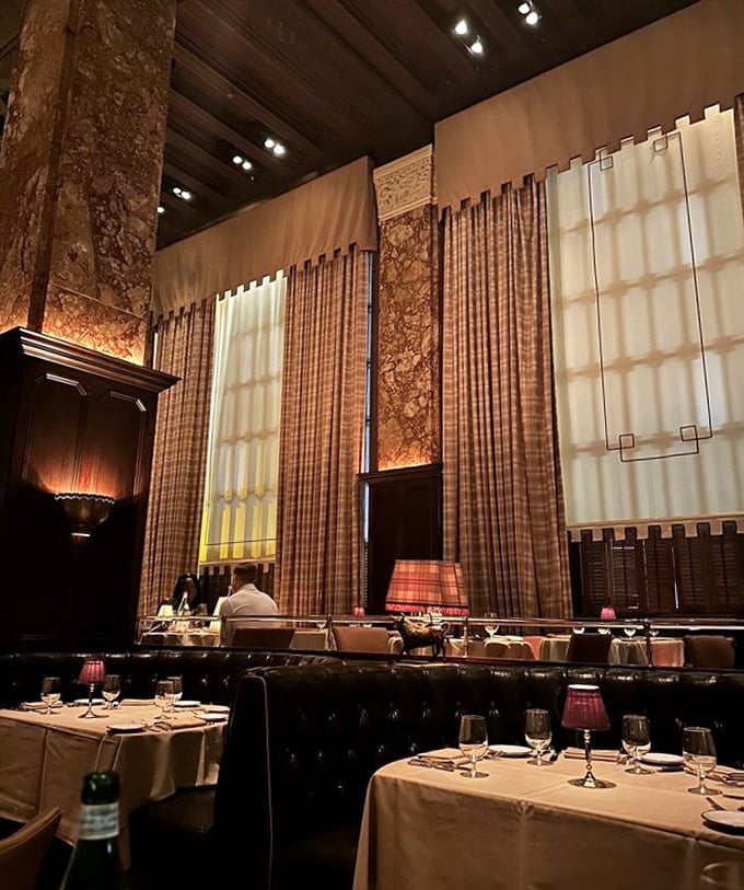 Soaring ceilings, dramatic drapery, and that golden glow—this isn't just dinner, it's dinner with a Hollywood ending.
