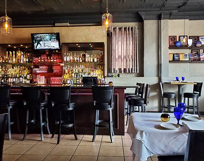 The bar area strikes that perfect balance—elegant enough for a special occasion, comfortable enough that you'll want to become a regular. 