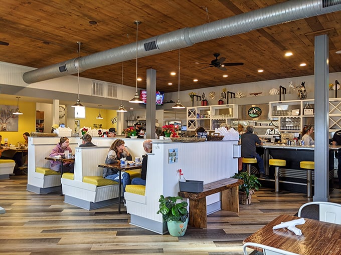 Wooden ceilings, yellow booths, and the buzz of happy diners—this isn't just a restaurant, it's Waynesville's living room.