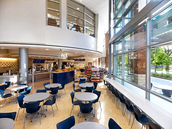 Bright, airy, and buzzing with anticipation—the interior where dreams come in scoops and calories don't count on campus.