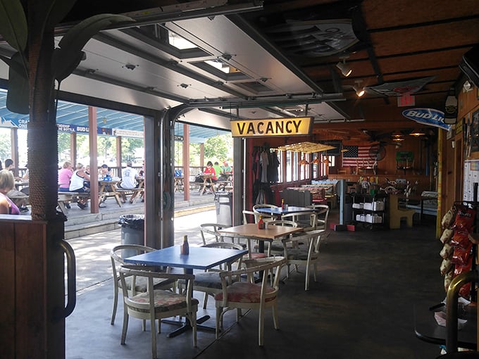 Step inside and the vacation vibes continue with that "VACANCY" sign—a playful reminder you're on lake time now.