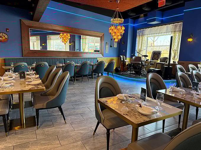 Rich blue walls and elegant hanging lanterns create an atmosphere that transports diners from Falls Church to the distant crossroads of Central Asia.