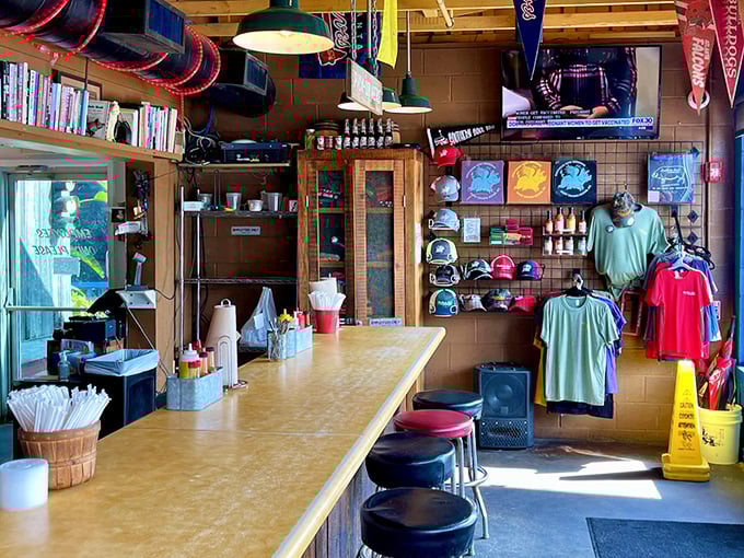 Inside, the vibe is pure Southern hospitality meets BBQ obsession. Sports pennants hang overhead while hungry patrons plot their meat strategy.