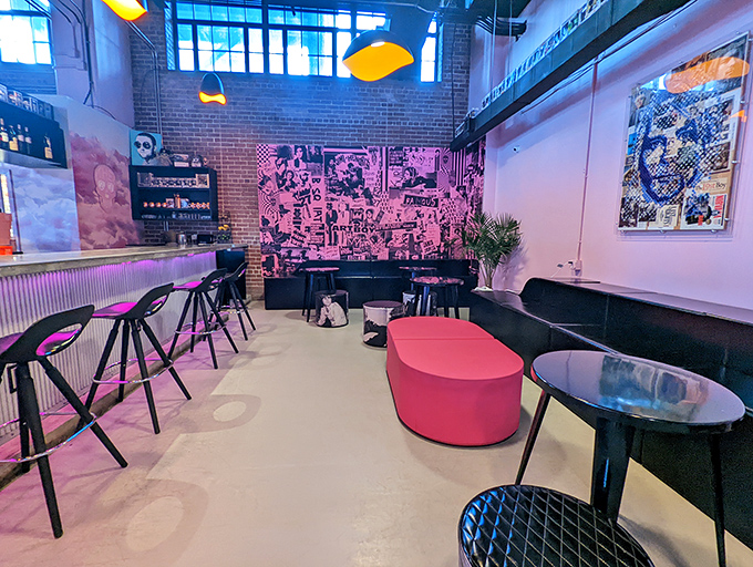 Industrial chic meets rock 'n' roll soul—exposed brick walls and pink accents create the perfect backdrop for both serious coffee talks and casual hangouts.