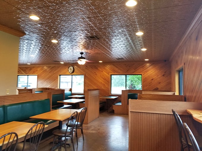 Wood-paneled walls and pressed tin ceiling create the perfect no-nonsense backdrop for serious eating. This isn't about ambiance—it's about making room for barbecue bliss.