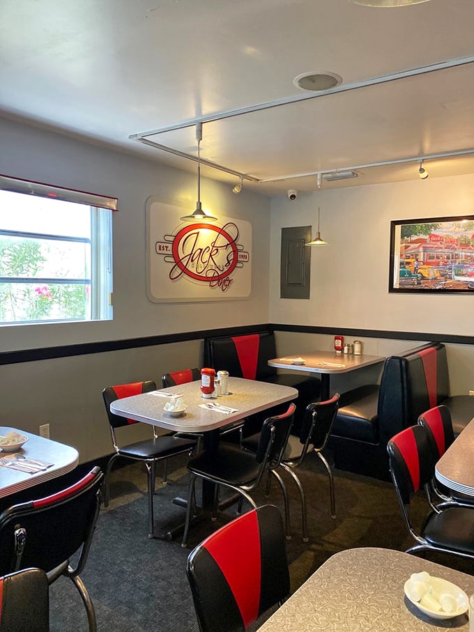 Classic black and red vinyl booths invite you to slide in and stay awhile. The retro charm isn't manufactured—it's marinated in decades of good conversations.