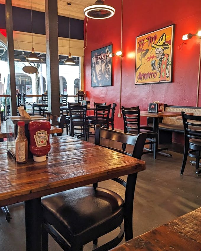 Inside, vibrant red walls and eclectic art create an atmosphere that's equal parts modern eatery and comfortable neighborhood hangout.