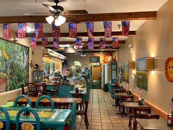 Stars, stripes, and syrup dreams. The interior feels like a patriotic hug, with American flags hanging from wooden beams above tables that have hosted countless happy conversations.
