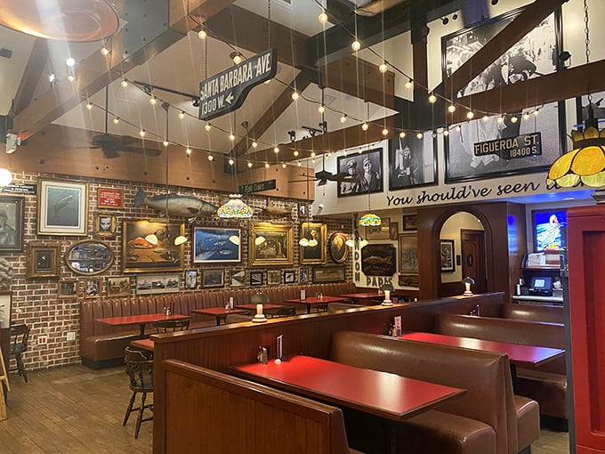 Like a time capsule of nautical nostalgia, the interior blends brick walls, wooden booths, and enough maritime memorabilia to outfit a small navy.