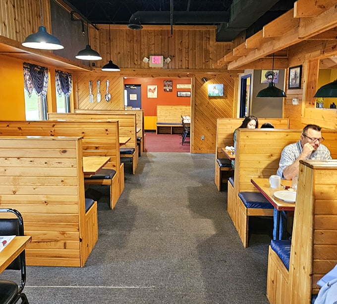 Wooden booths that could tell a thousand breakfast stories. This isn't designer ambiance; it's authentic small-town comfort at its finest.