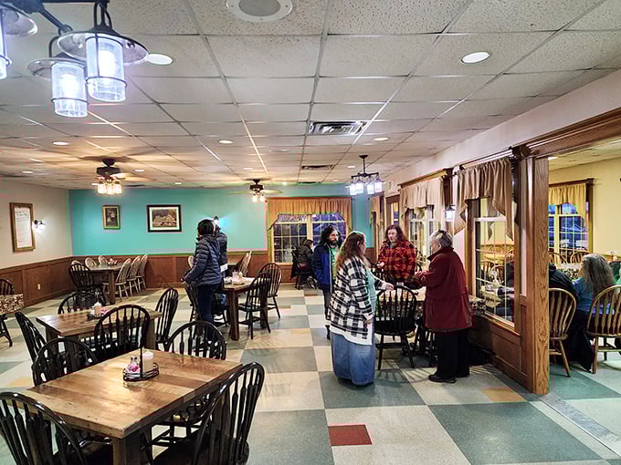 Inside, the checkerboard floor and wooden chairs aren't trying to impress anyone—they're just setting the stage for the real star: the food.