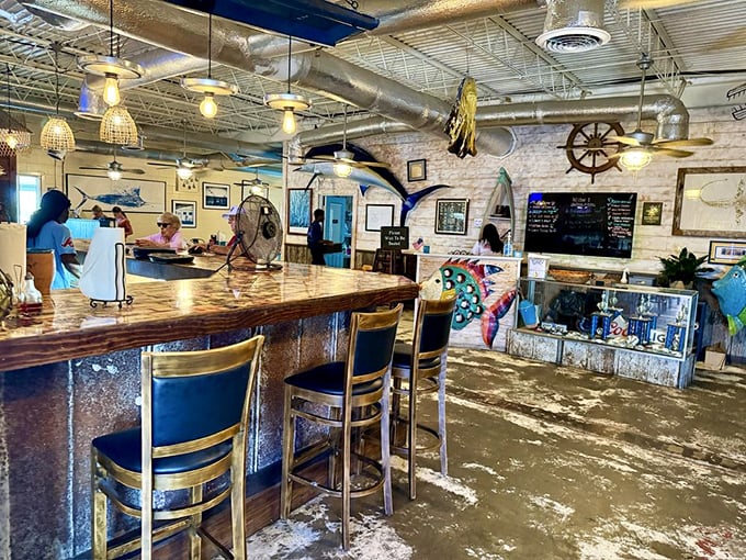 That weathered concrete floor has stories to tell – and thankfully, none involve fancy dress codes or pretentious attitudes.