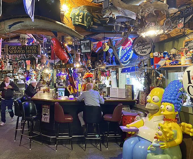 Step inside and you're greeted by a fisherman's paradise—where neon beer signs illuminate treasures from the deep and even Homer Simpson has secured a permanent seat at the bar.