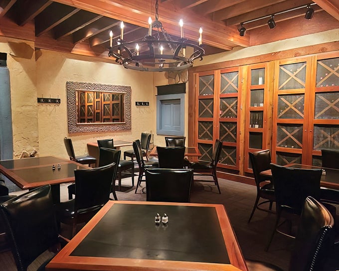 Step inside and the transformation is magical – rustic wooden beams, warm lighting, and wine cabinets that whisper, "Stay awhile."