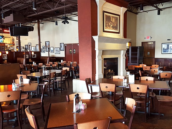 High ceilings, warm wood tones, and that magnificent fireplace create the perfect backdrop for comfort food that hugs your soul.