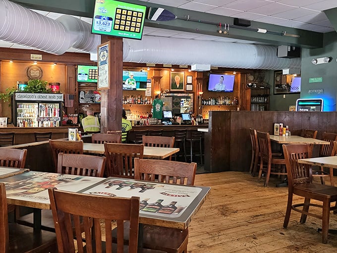 Where everybody knows your name? This cozy interior balances sports bar energy with old-school pub comfort—wooden chairs waiting for stories to be told.