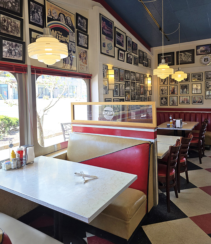 Classic red vinyl booths and checkerboard floors create the perfect backdrop for making memories, while vintage photos remind us some things are timeless—like good conversation over coffee.