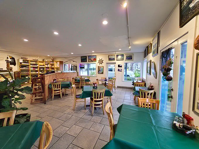 Simple wooden tables, green tablecloths, and nautical decor create the perfect backdrop for seafood that needs no fancy setting to shine. This is where locals come when they want the real deal.