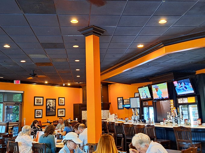 The vibrant orange walls create an atmosphere that's both energizing and comforting—like that perfect cup of morning coffee when you're actually well-rested.