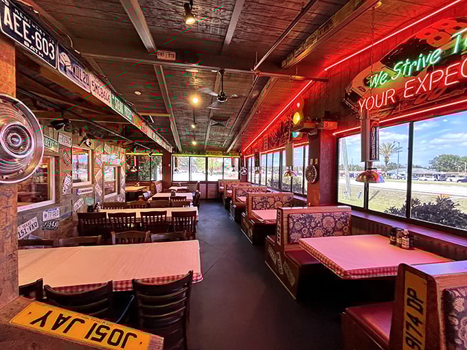 Inside Manny's, the red vinyl booths and license plate-covered walls create the perfect backdrop for decisions that will haunt your bathroom scale tomorrow.