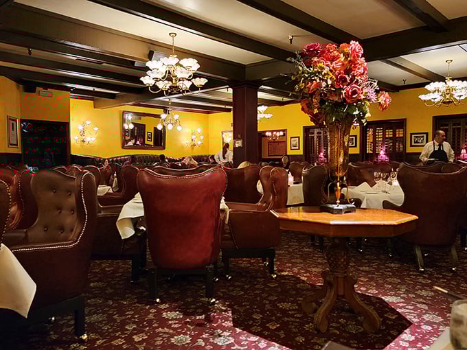 Plush leather chairs and golden walls create an atmosphere where Frank Sinatra would feel right at home—classic elegance without an ounce of pretension. 