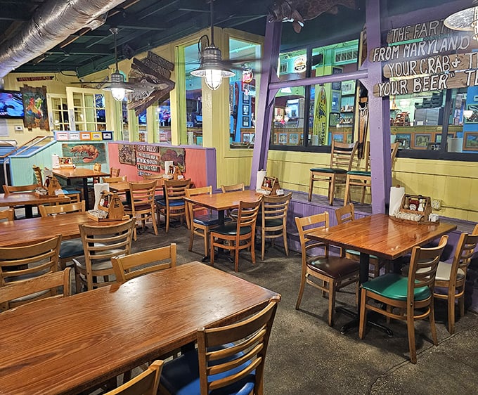 Inside, colorful walls and wooden tables create that perfect "coastal casual" vibe where flip-flops are welcome and seafood stories flow as freely as the cocktails.